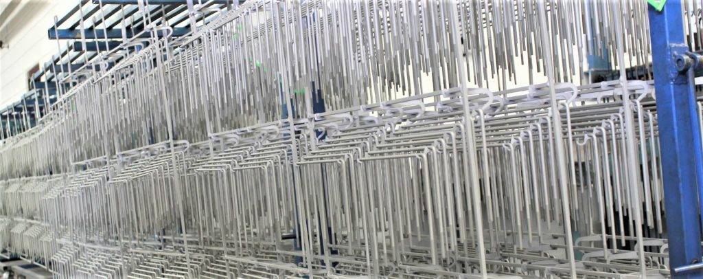 Magni 565: The Gold Standard of Zinc-Flake Coating Systems - DECC